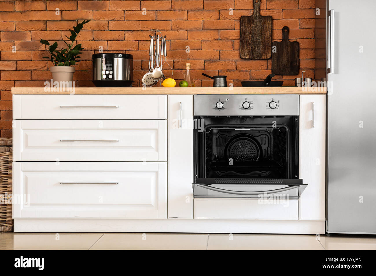 Interior of kitchen with modern oven Stock Photo - Alamy