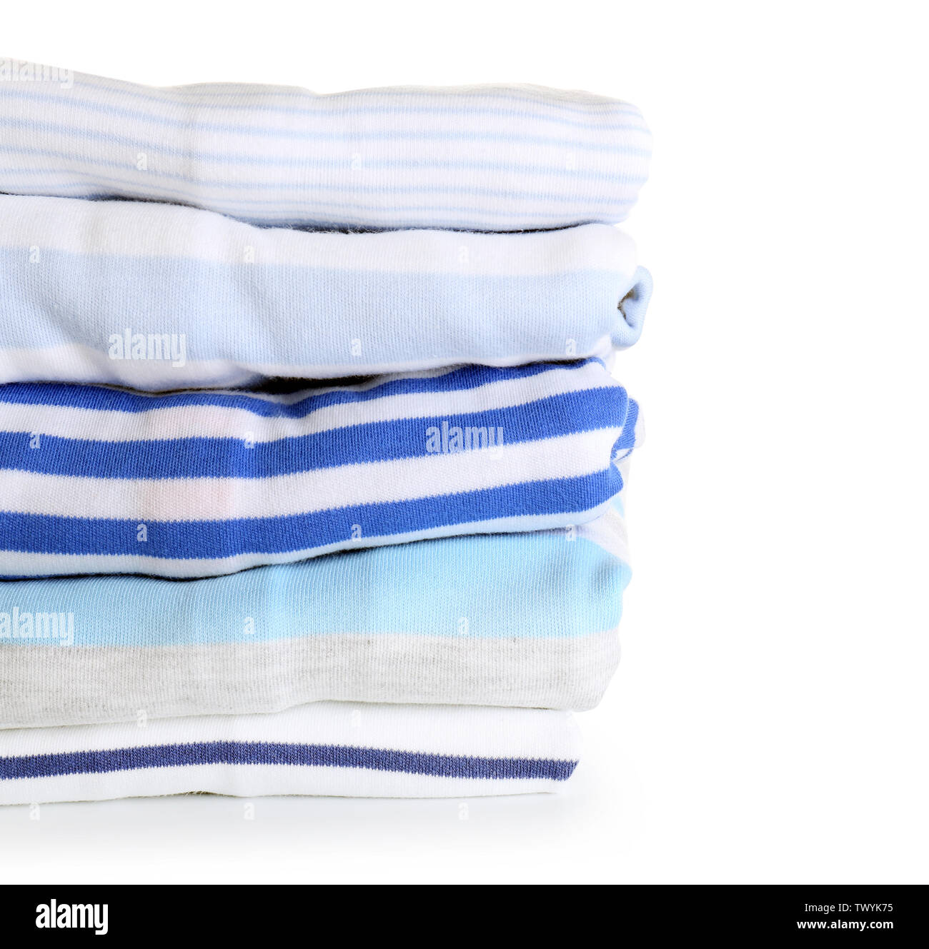 Stack of modern clothes on white background Stock Photo - Alamy