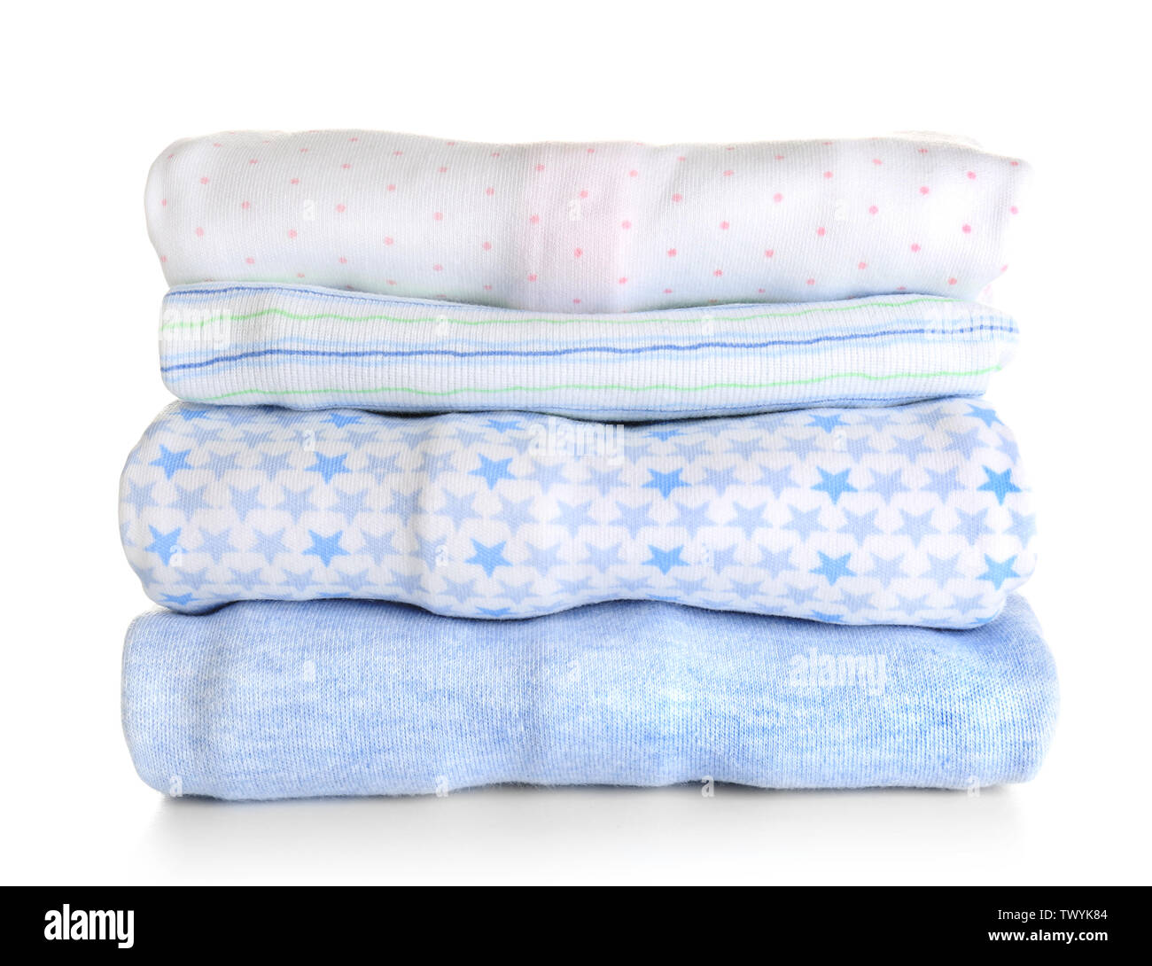 Stack of baby clothes on white background Stock Photo - Alamy