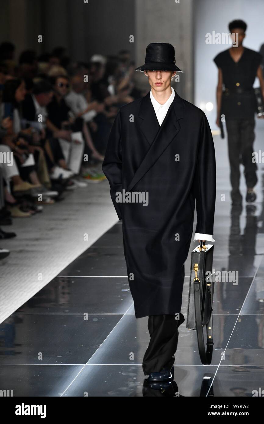 Paris, France. 23rd June, 2019. A model presents a creation of Dunhill ...