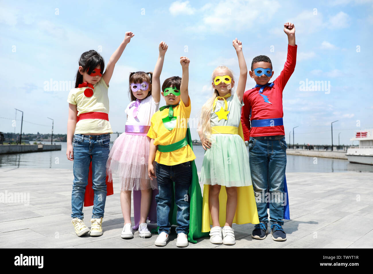 Cute little children dressed as superheroes outdoors Stock Photo - Alamy
