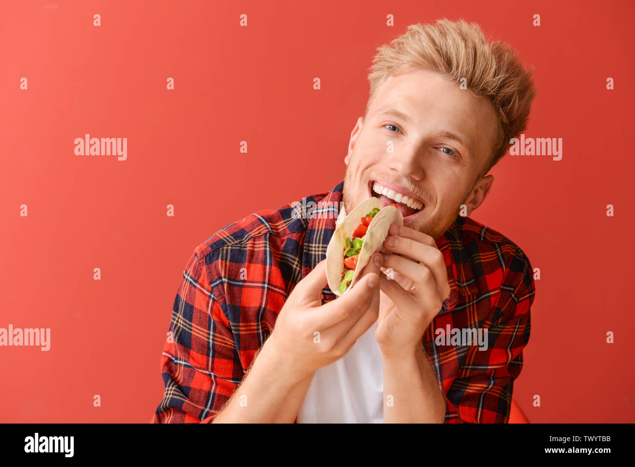 Man eating taco hi-res stock photography and images - Alamy