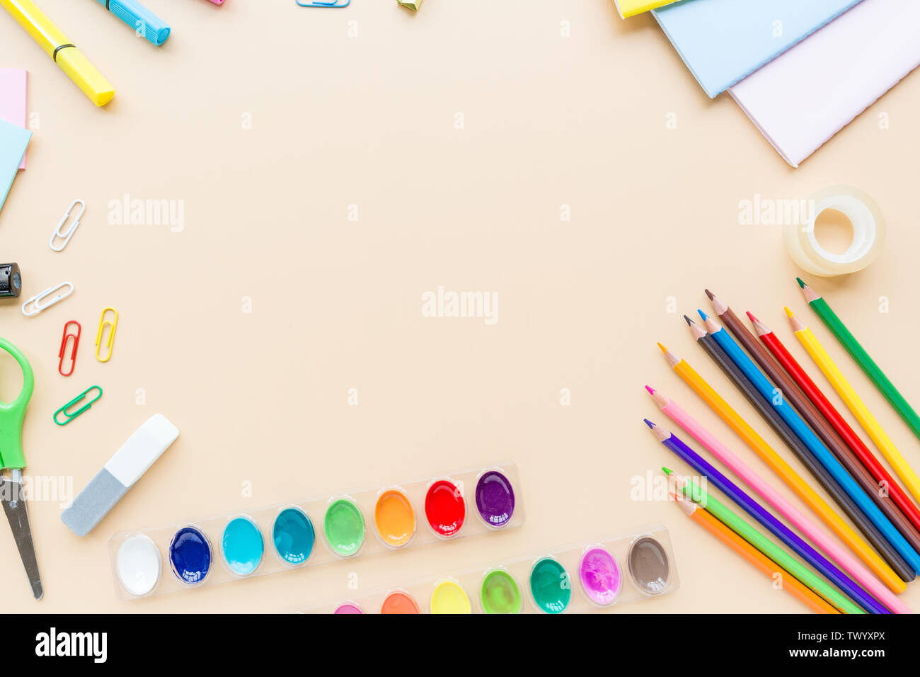 Orange back to school flat lay with bright stationery. School supplies ...
