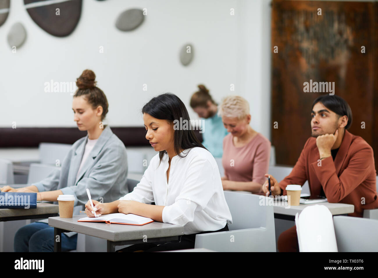 College students lecture side view hi-res stock photography and images ...