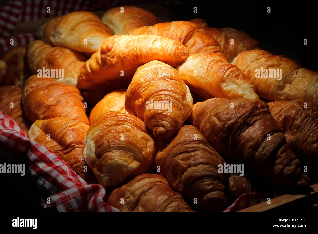 pile of croissant bread on buffet line Stock Photo - Alamy