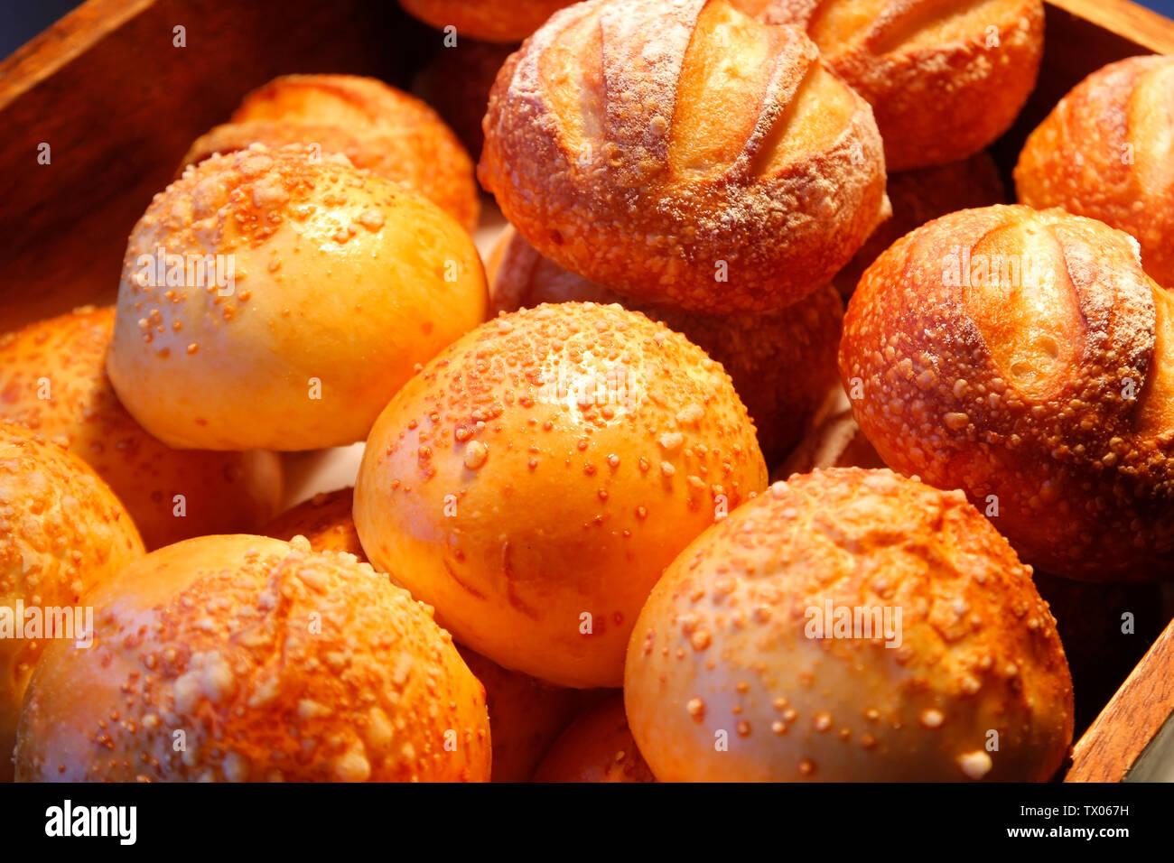 pile of bread roll on buffet line Stock Photo - Alamy