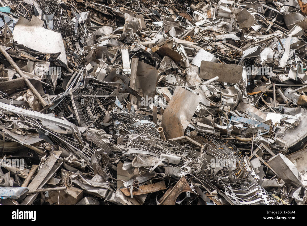 Pile of scrap metal at metal recycling facility Stock Photo - Alamy