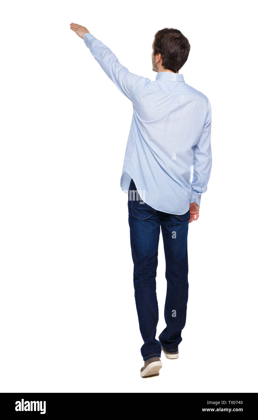 Back view of a man walking with a pointing hand. going guy showing ...
