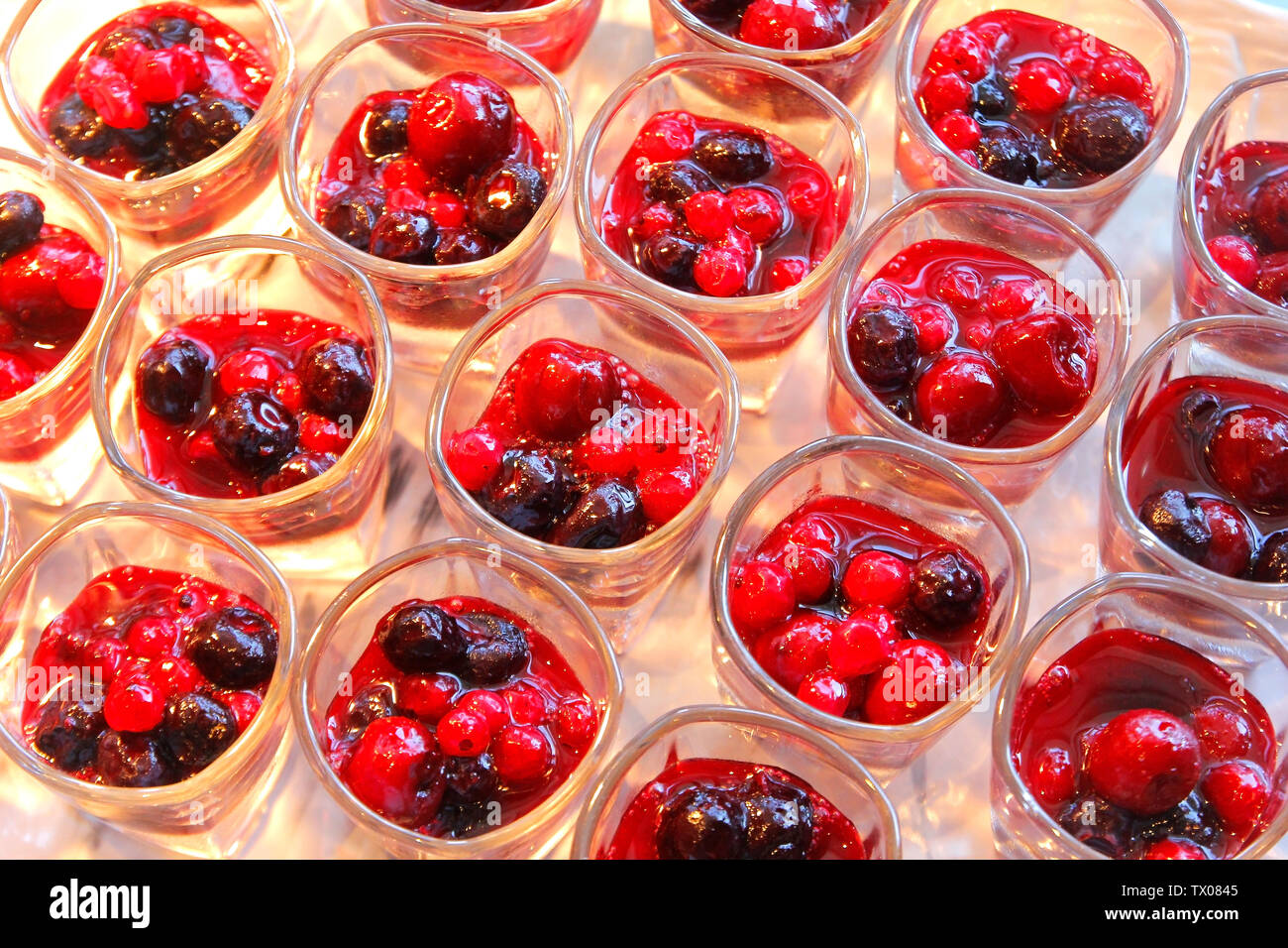 fresh dessert with strawberry jam and cherries on buffet line Stock ...