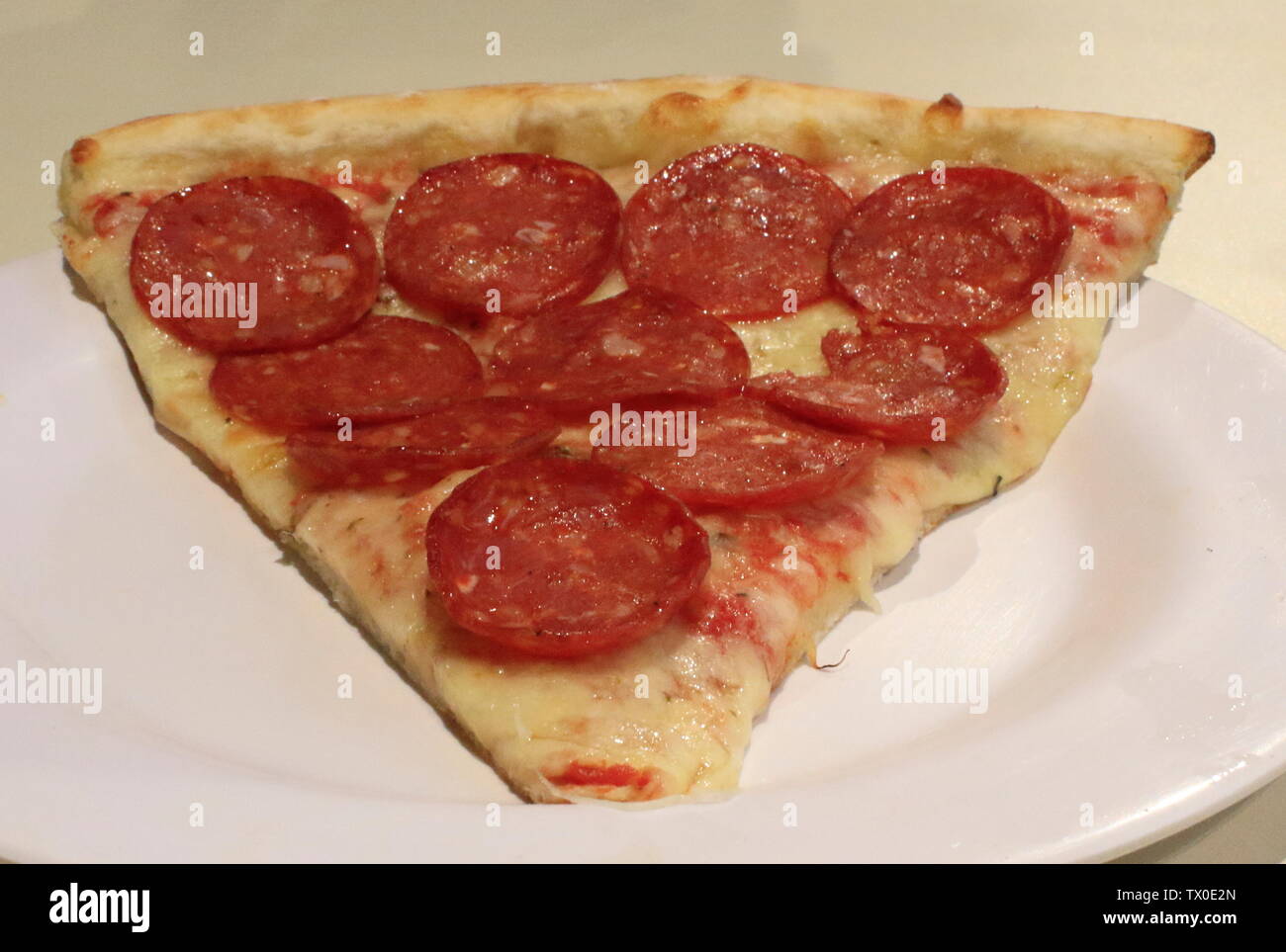 Pizza triangle hi-res stock photography and images - Alamy
