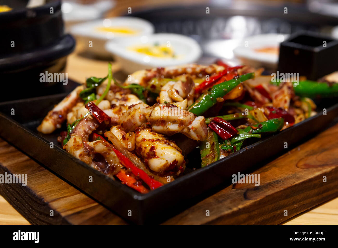 Iron squid cuisine Stock Photo - Alamy