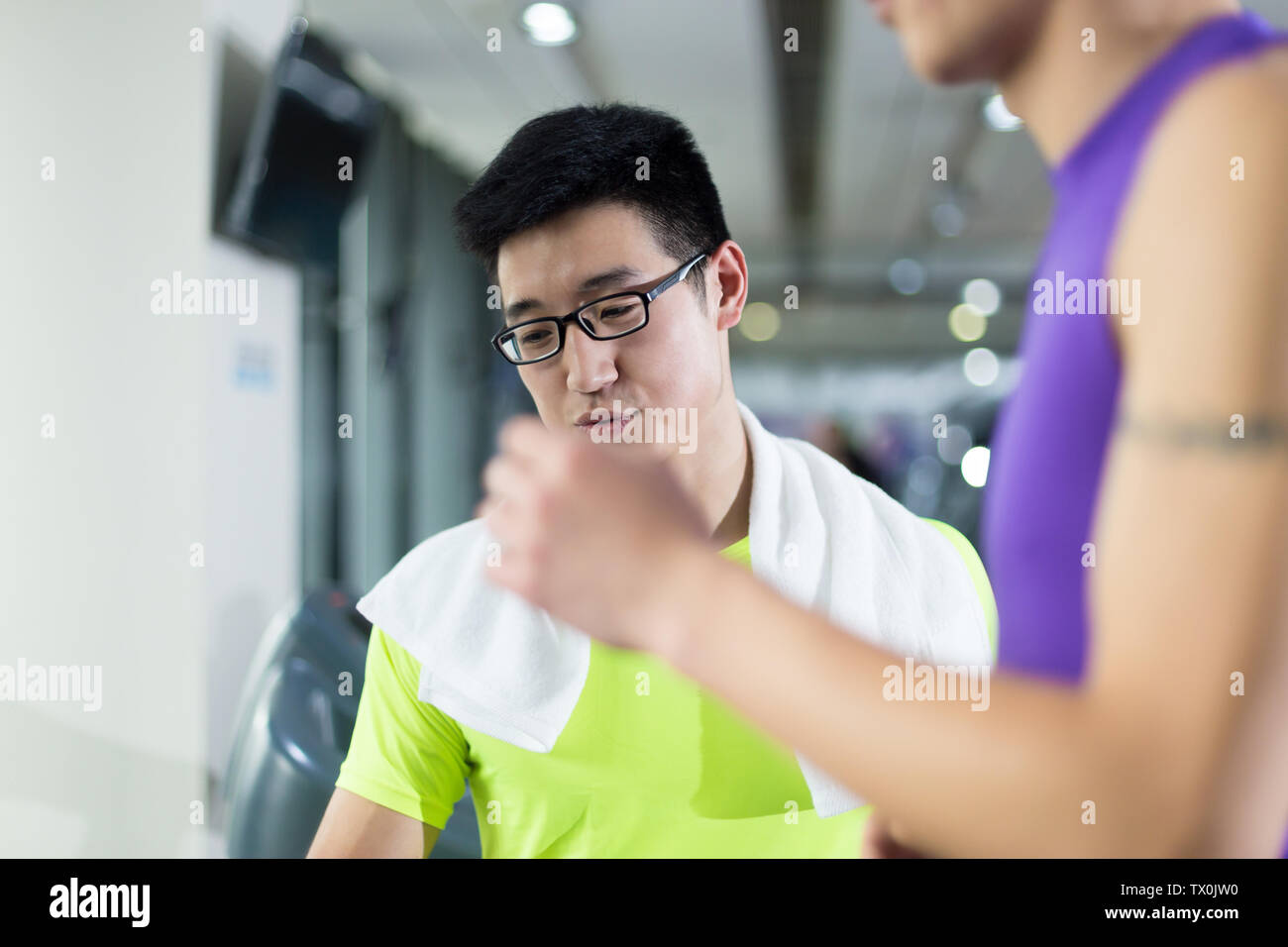 young asian people working out in modern gym Stock Photo - Alamy