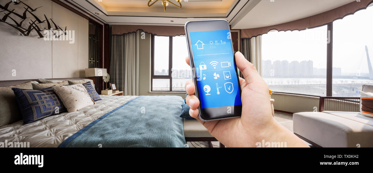 smart phone with smart home with modern bedroom Stock Photo - Alamy