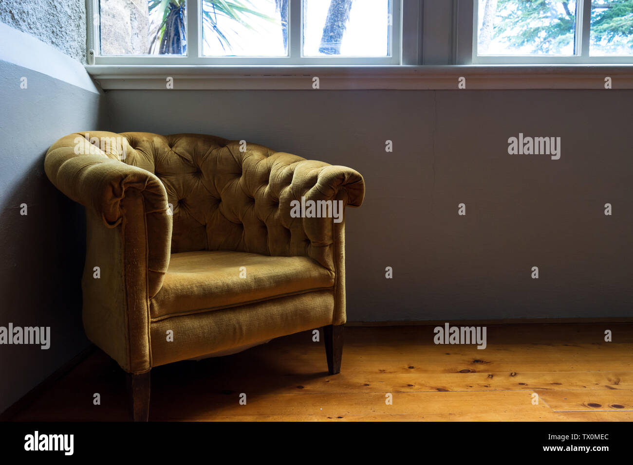 Old style chair in empty room Stock Photo - Alamy
