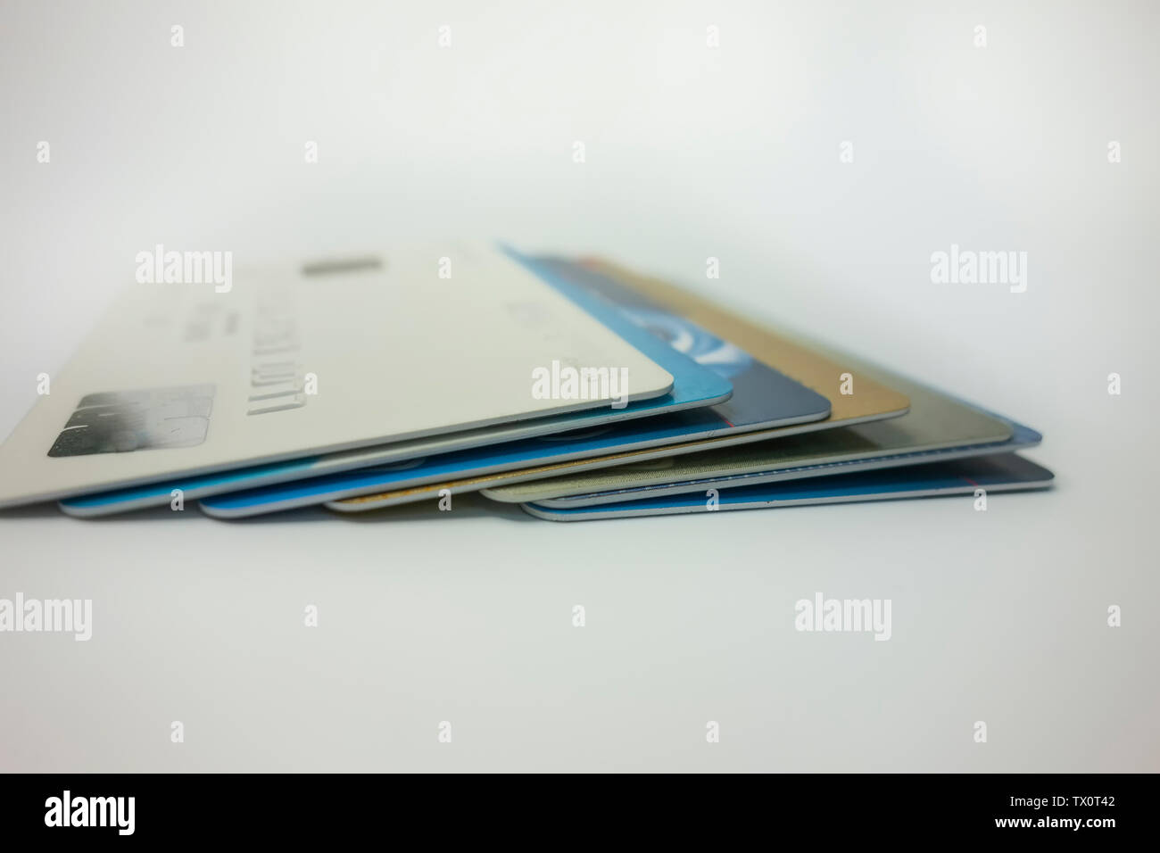 Multiple bank cards stacked together Stock Photo - Alamy