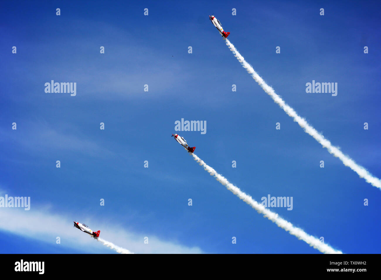 Four airplanes flying in formation at an Air Show Stock Photo - Alamy
