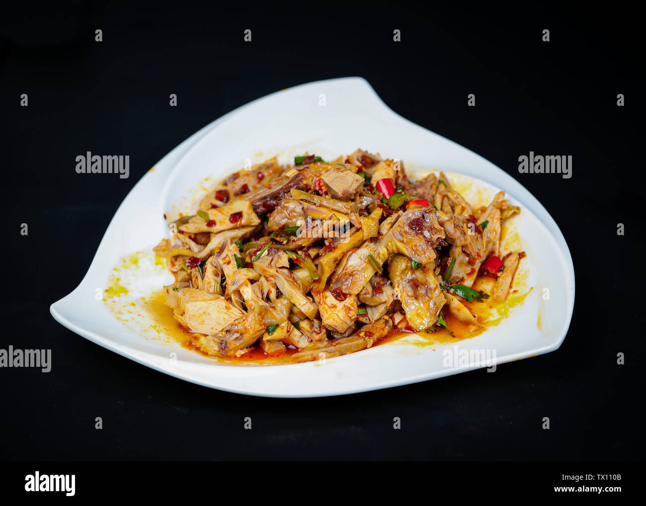 drooling chicken, stick chicken Stock Photo - Alamy