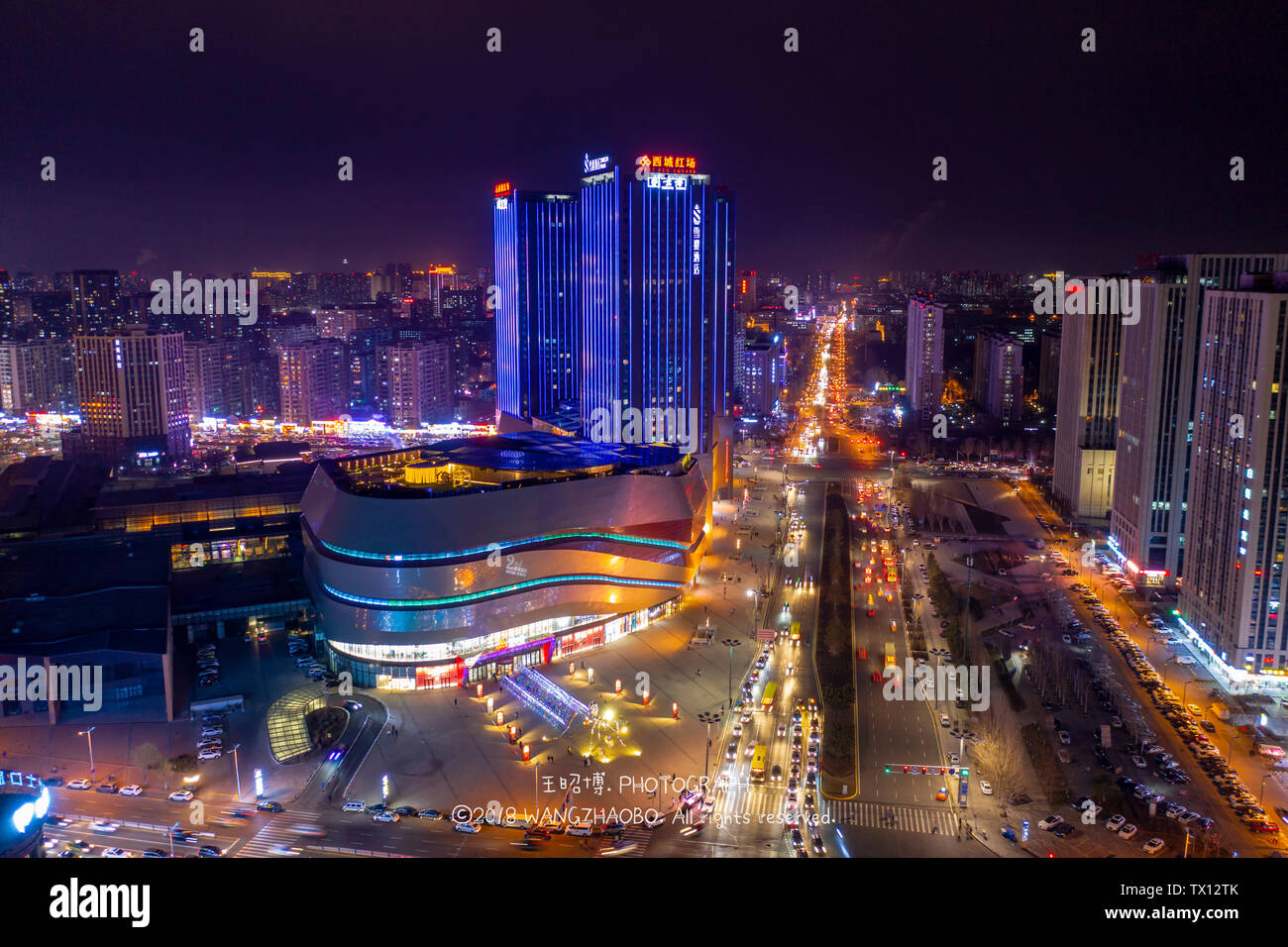 Night view of Harbin Hasiwanda Square Stock Photo - Alamy