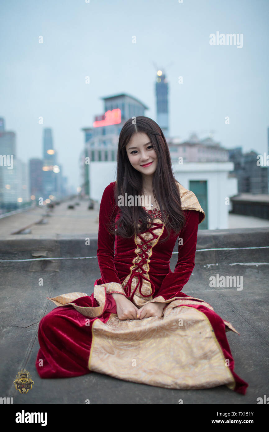 The beautiful mage in red Stock Photo - Alamy