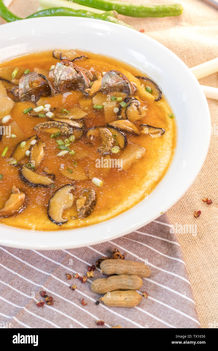 Abalone steamed eggs Stock Photo - Alamy
