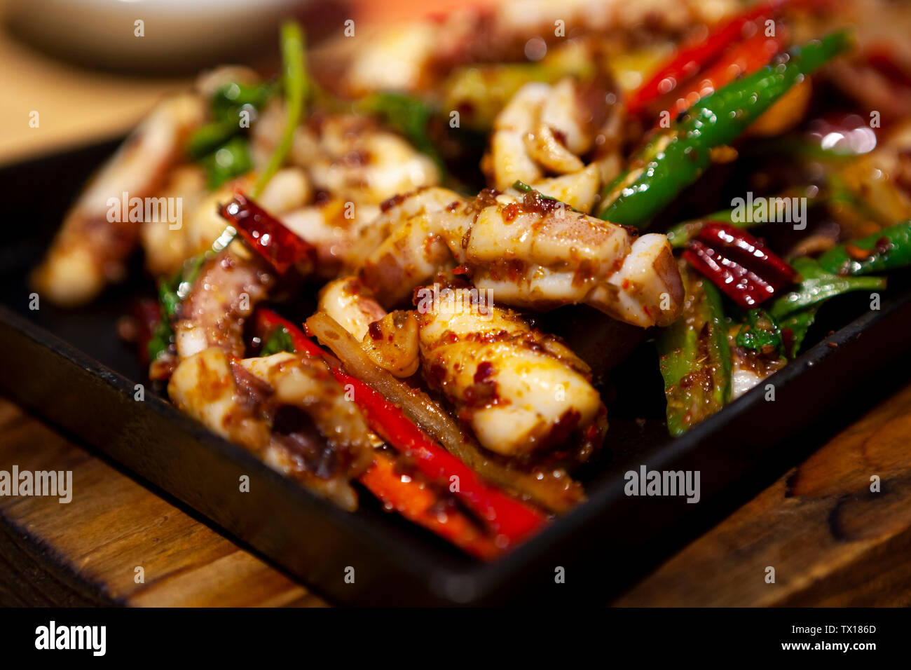 Iron plate squid hi-res stock photography and images - Alamy