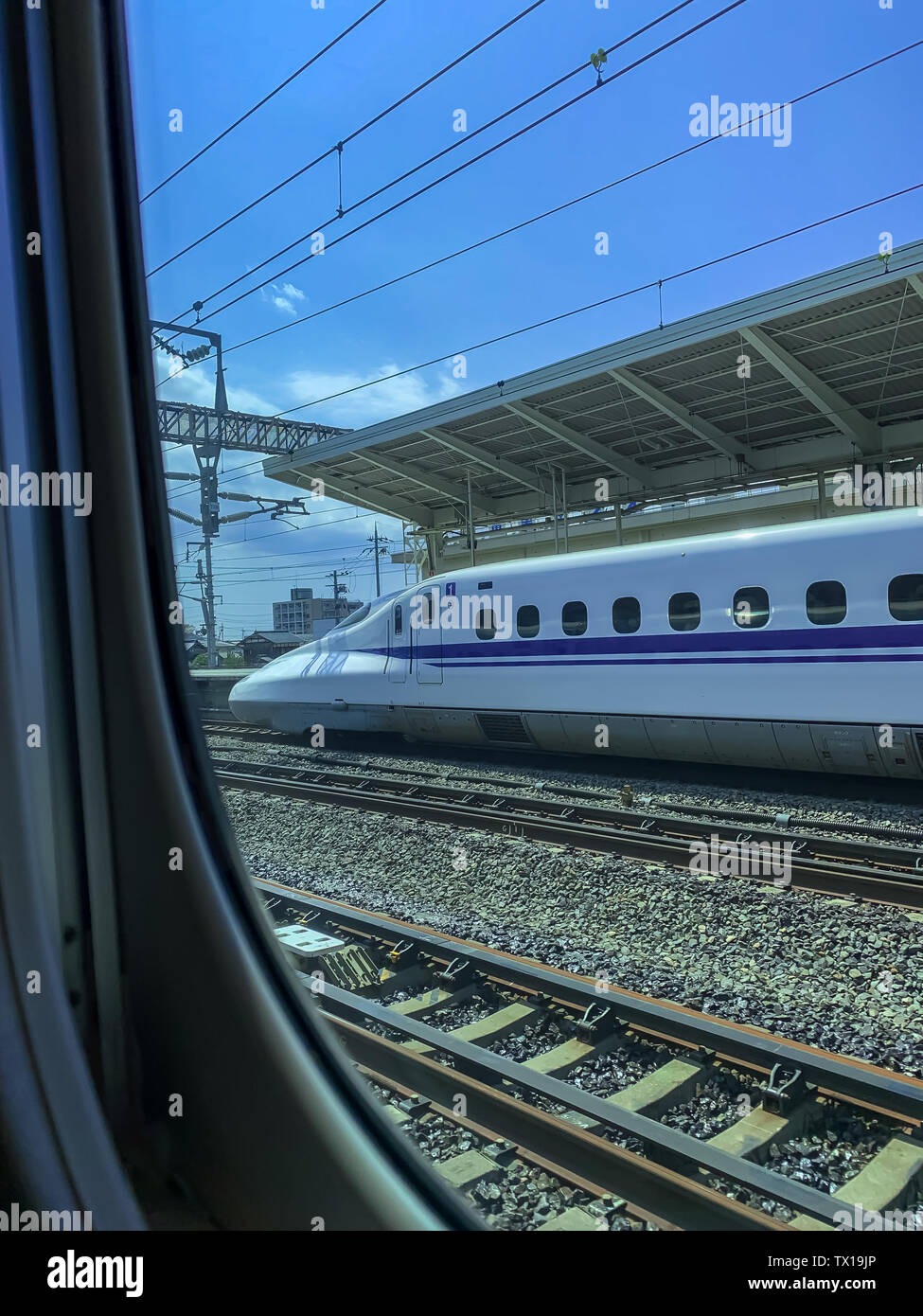 View from a train window to passing Shinkansen (Bullet Train), Nagoya ...