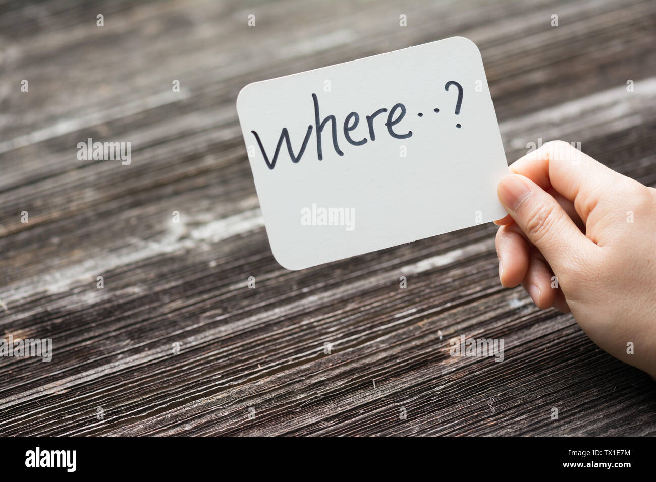 Reynolds card with text on old wood plate Stock Photo - Alamy