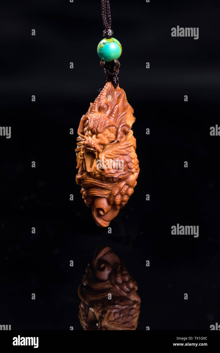 The olive core carved the dragon hi-res stock photography and images ...