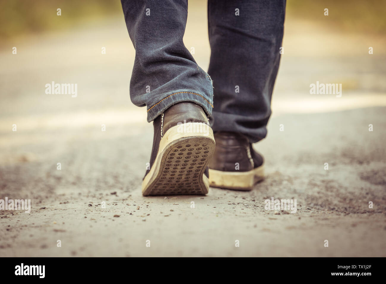 The road is at the foot of the road Stock Photo - Alamy