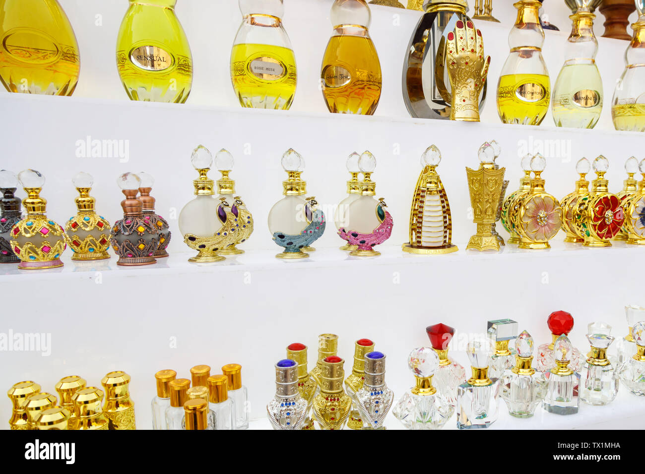 DUBAI, UAE, JANUARY 13, 2019: Richly decorated bottles with Arab ...
