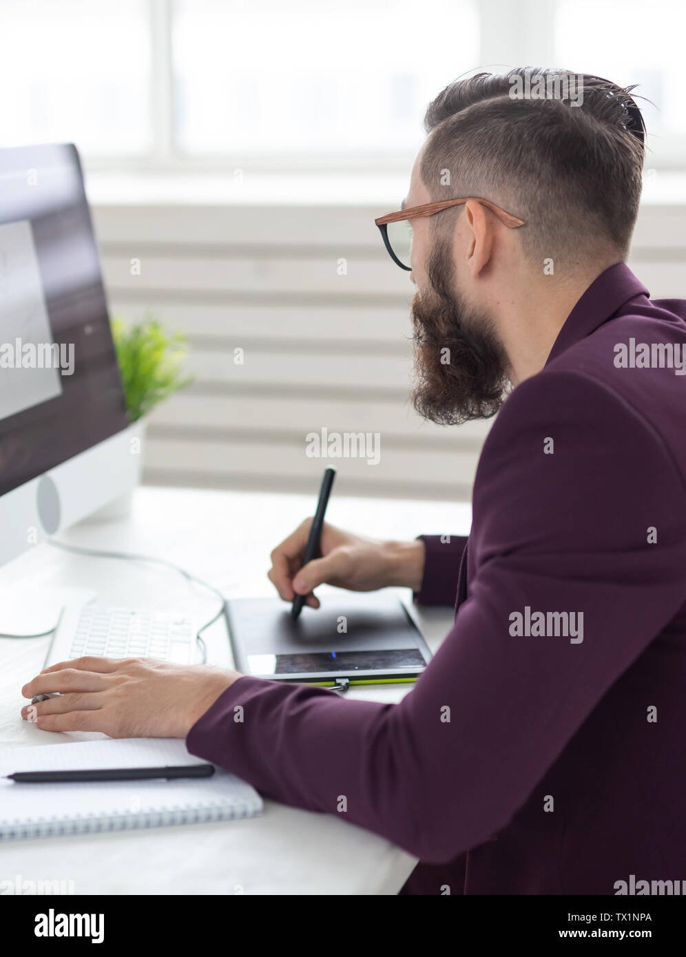 people, design and style concept - graphic designer sketching new ...