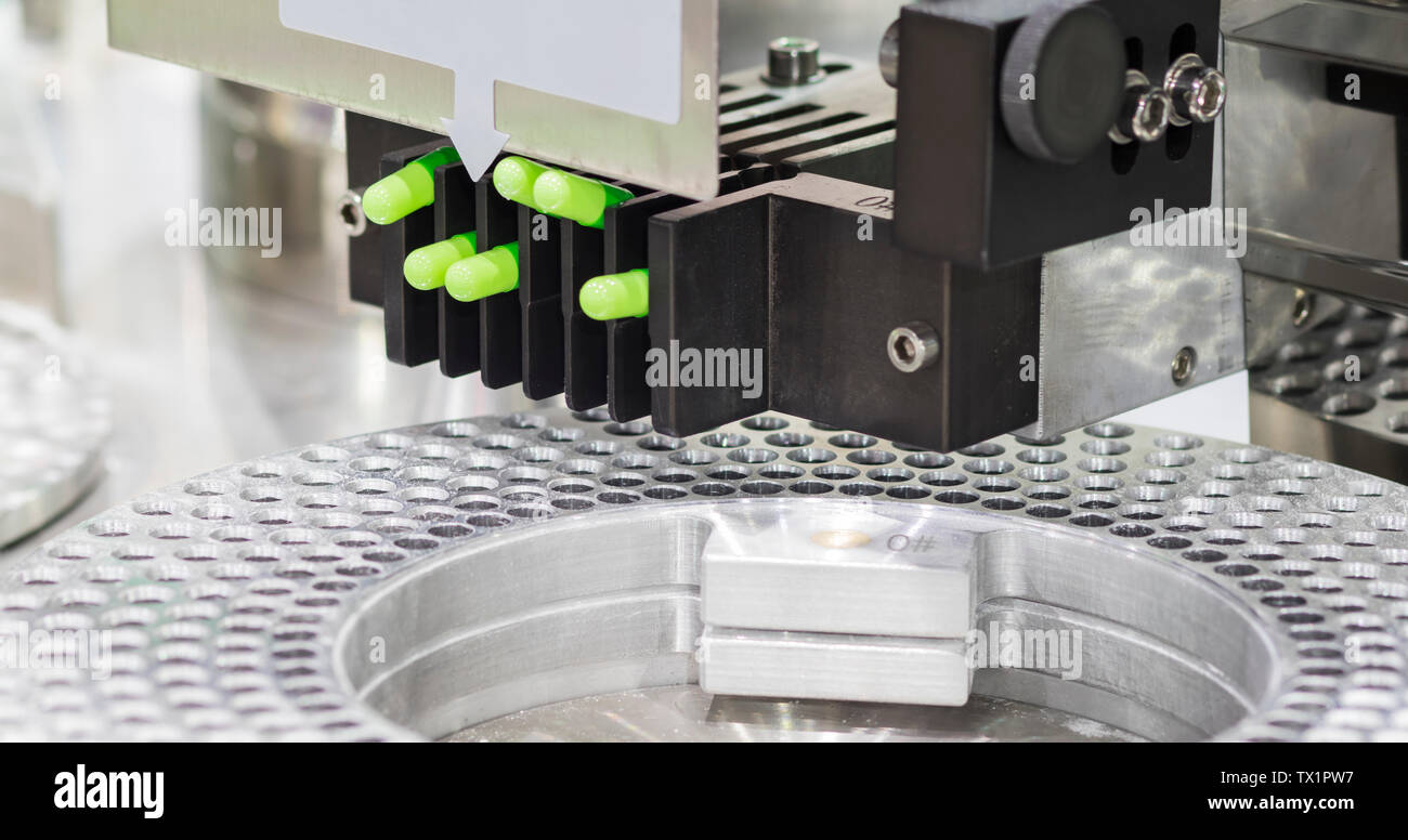 medicine capsules packing machine ; process Stock Photo - Alamy