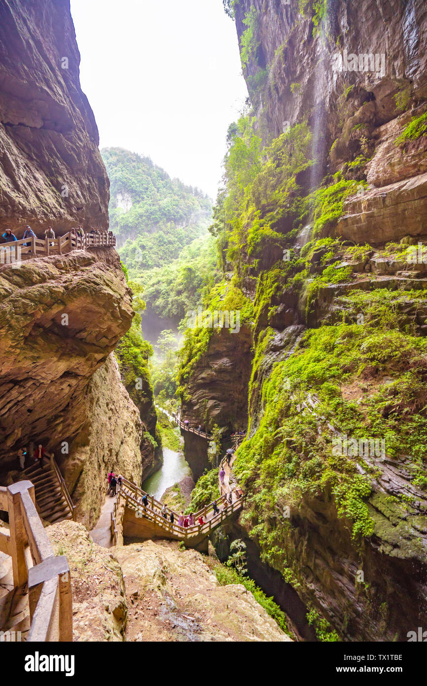 Walking in the mountains canyon road crowd People walking in the middle ...