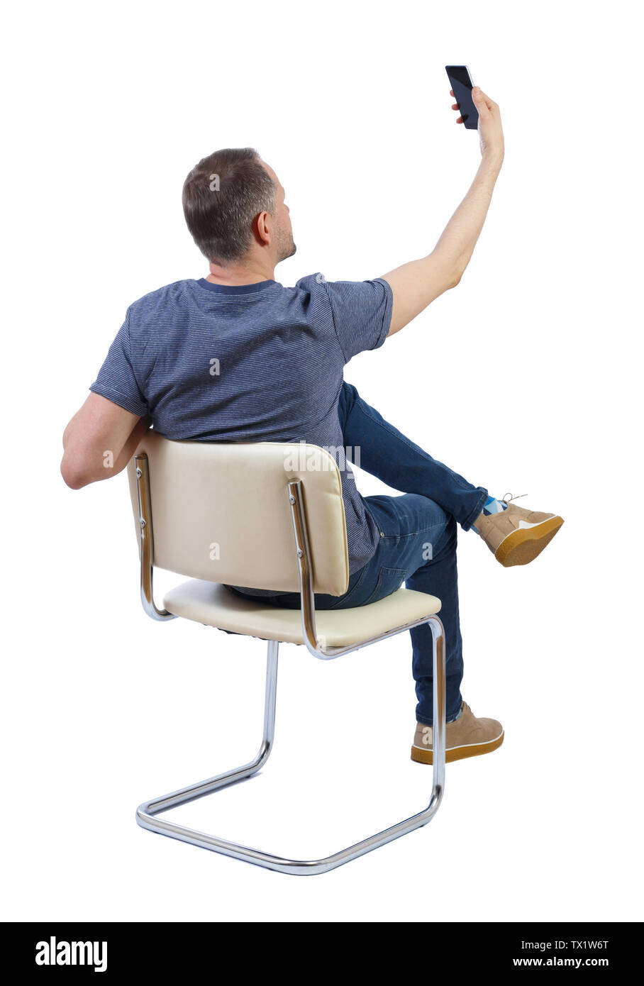 Rear view of a man with a smartphone. Rear view people collection Stock ...