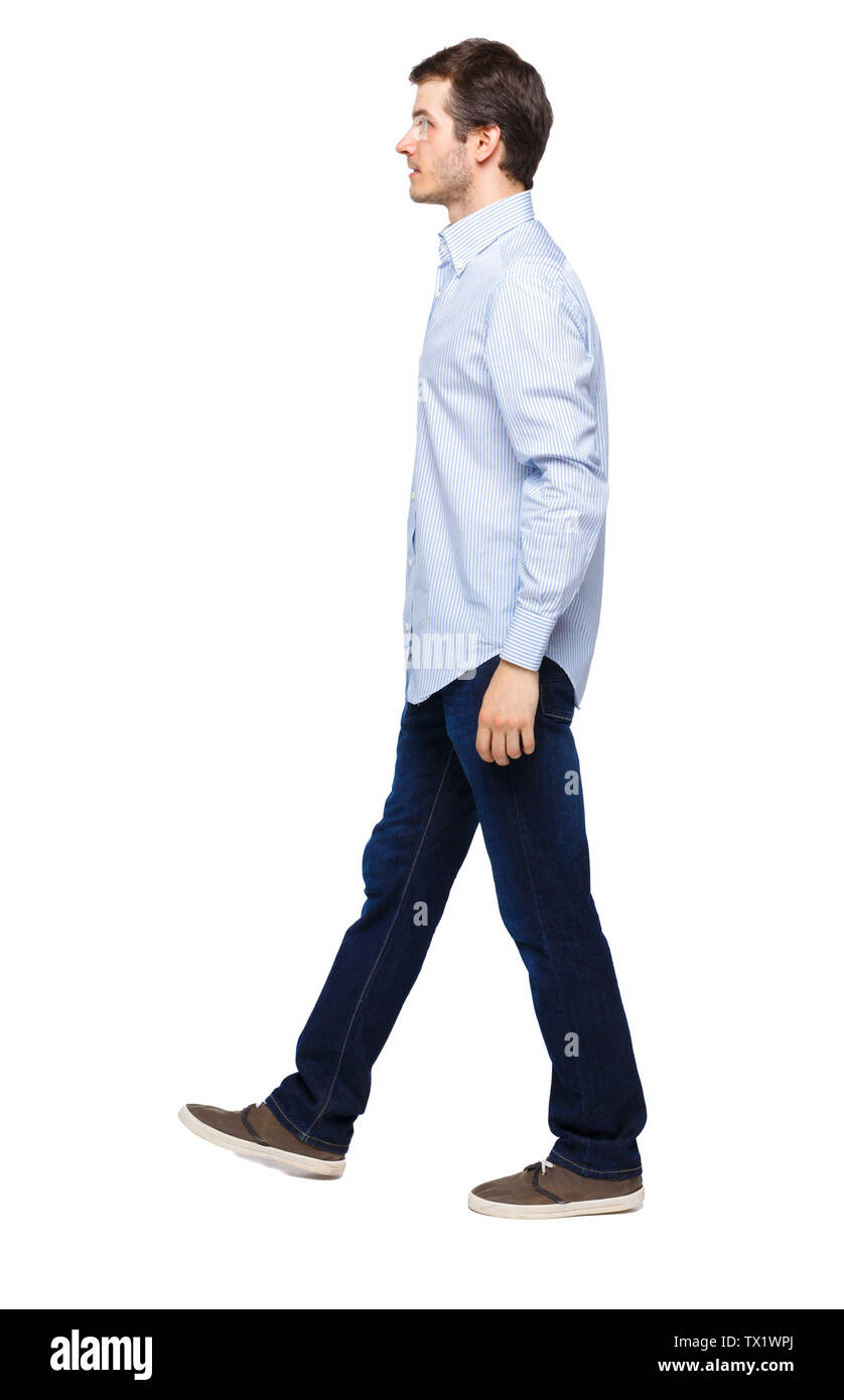 Side view of going handsome man. walking young guy . Rear view people ...