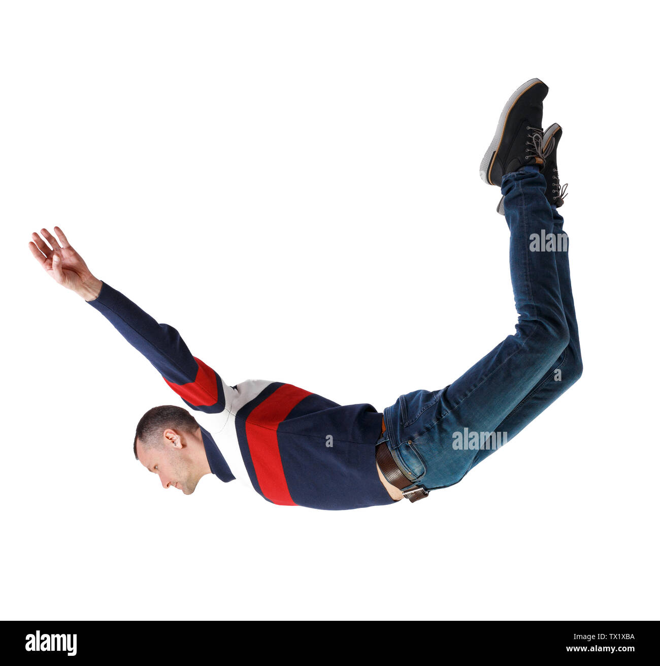 Side view of man in zero gravity or a fall. guy is flying, falling or ...