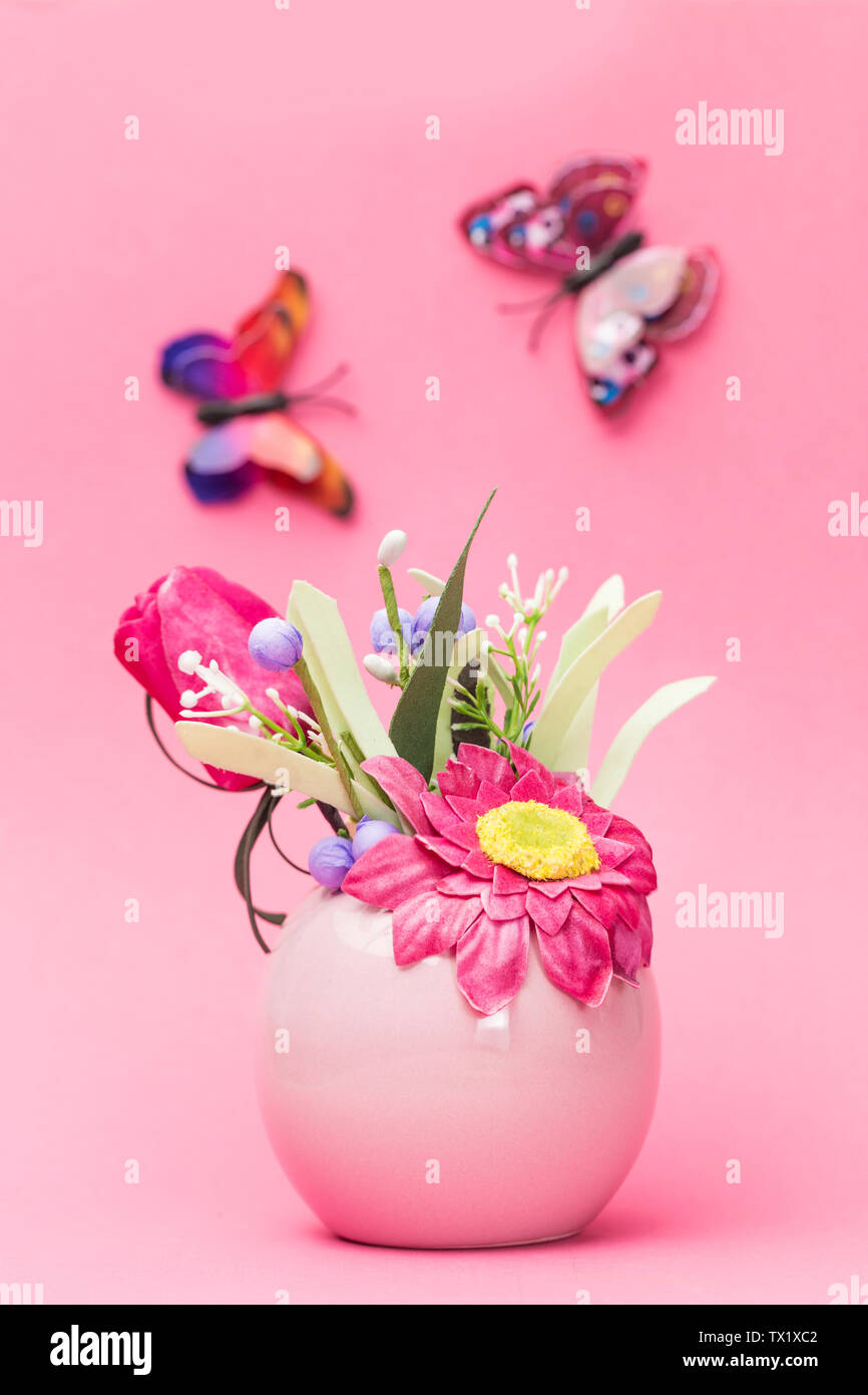 Pot plants in solid color background Stock Photo - Alamy