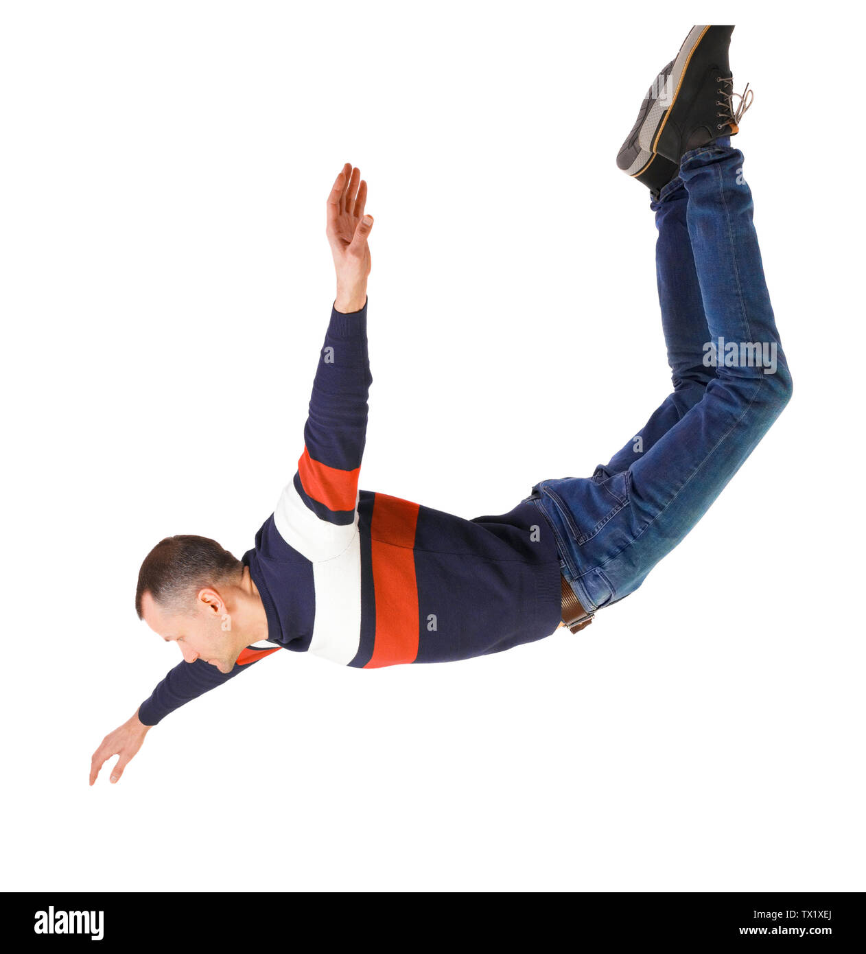 Side view of man in zero gravity or a fall. guy is flying, falling or ...