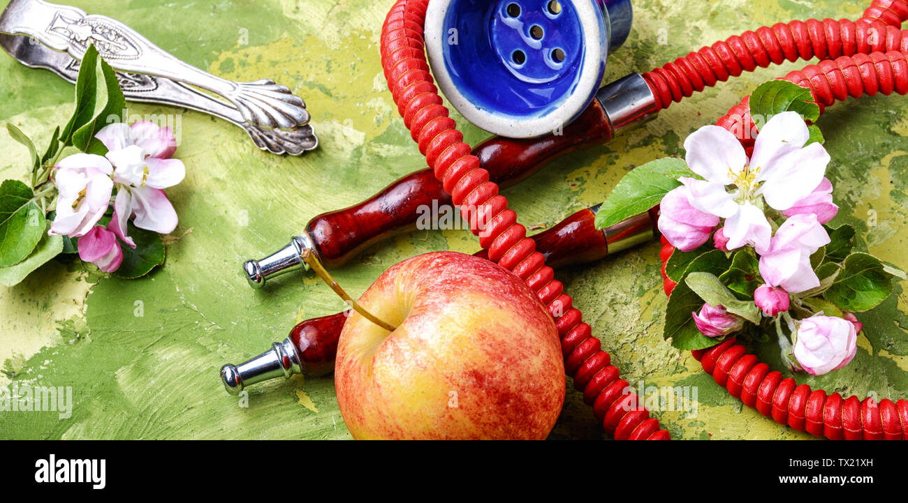 Modern fruit hookah.Eastern shisha with apple.Hookah and apple Stock ...