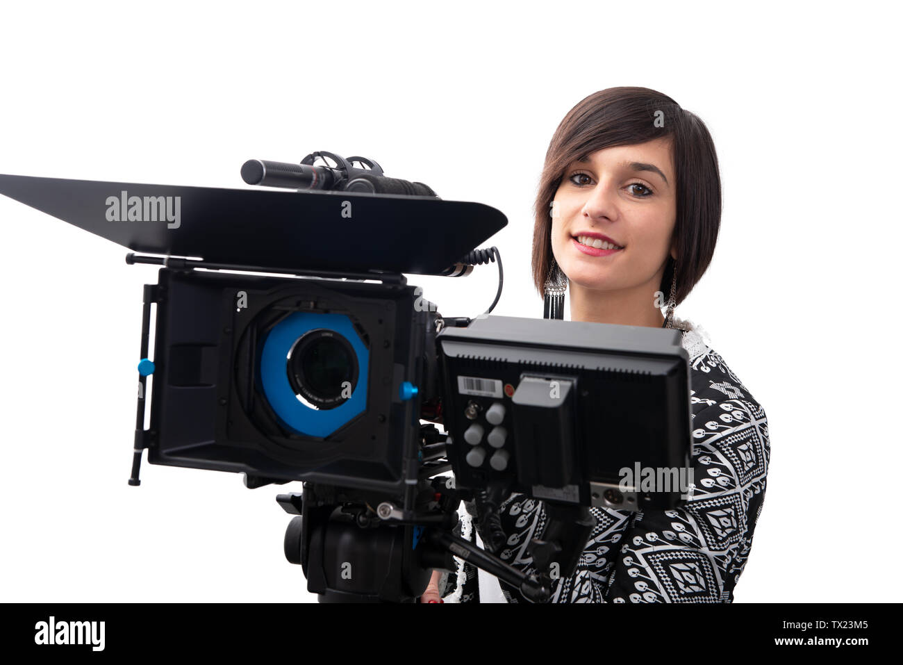 a young woman with professional video camera, SLR, on white Stock Photo ...