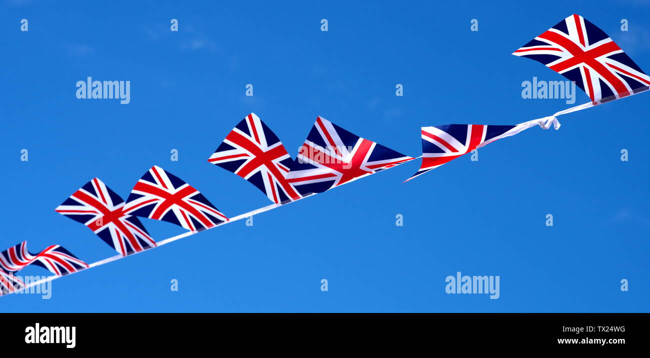 pretty many United Kingdom (UK) flags placed diagonal with bokeh and ...