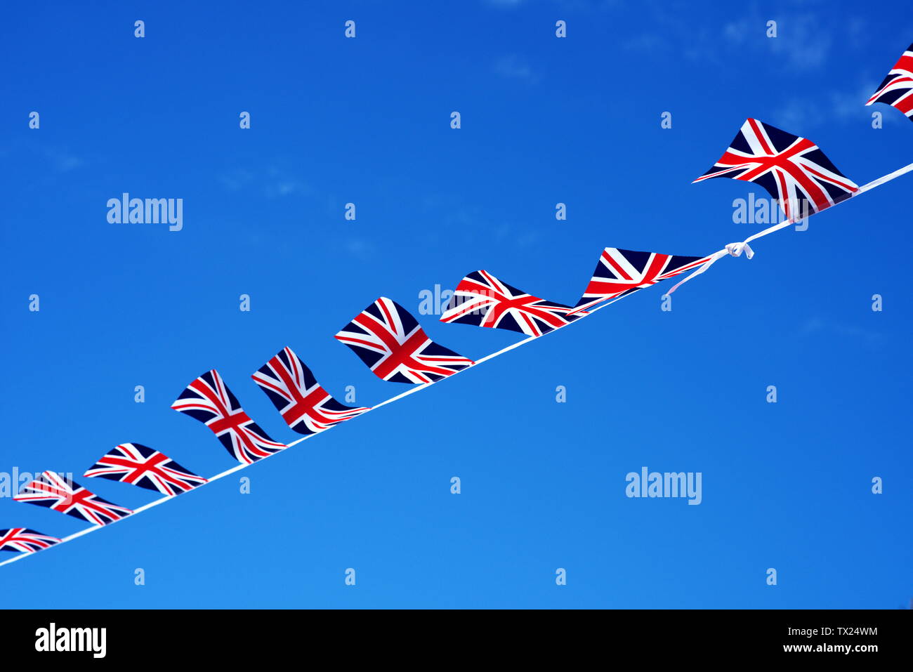 pretty many United Kingdom (UK) flags placed diagonal with bokeh and ...