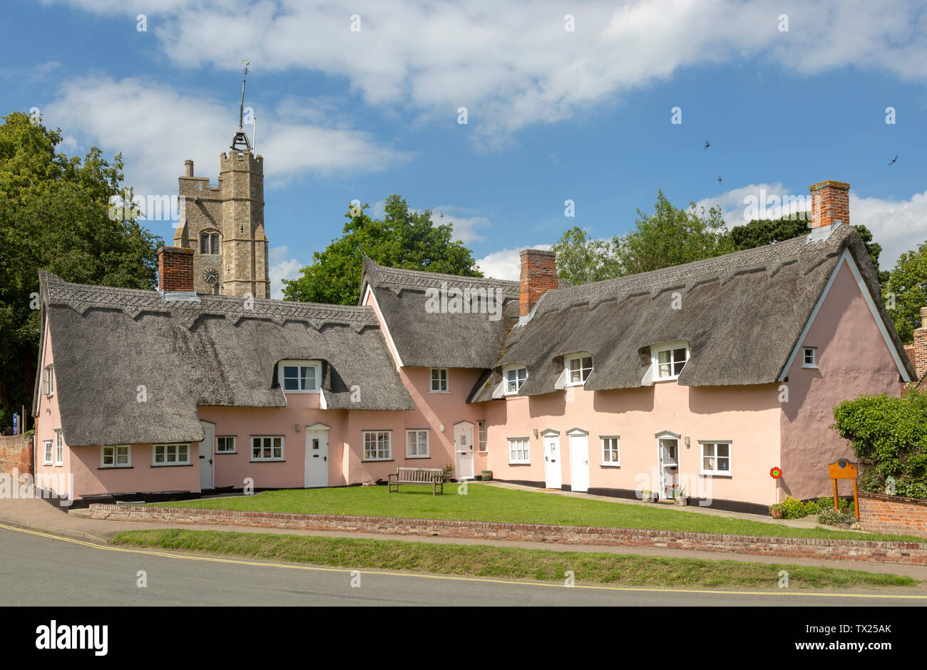 Attractive pink thatched cottages and church village of Cavendish ...