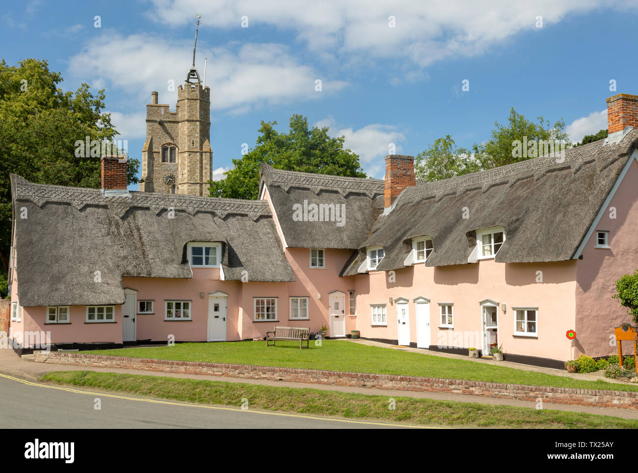 Attractive pink thatched cottages and church village of Cavendish ...