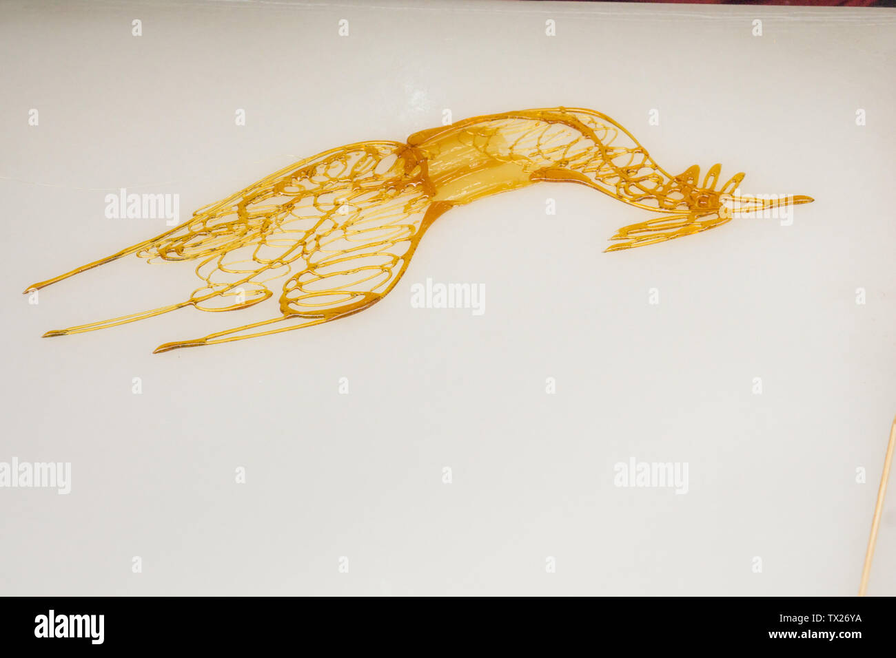 Chinese traditional snack sugar painting close-up Stock Photo - Alamy