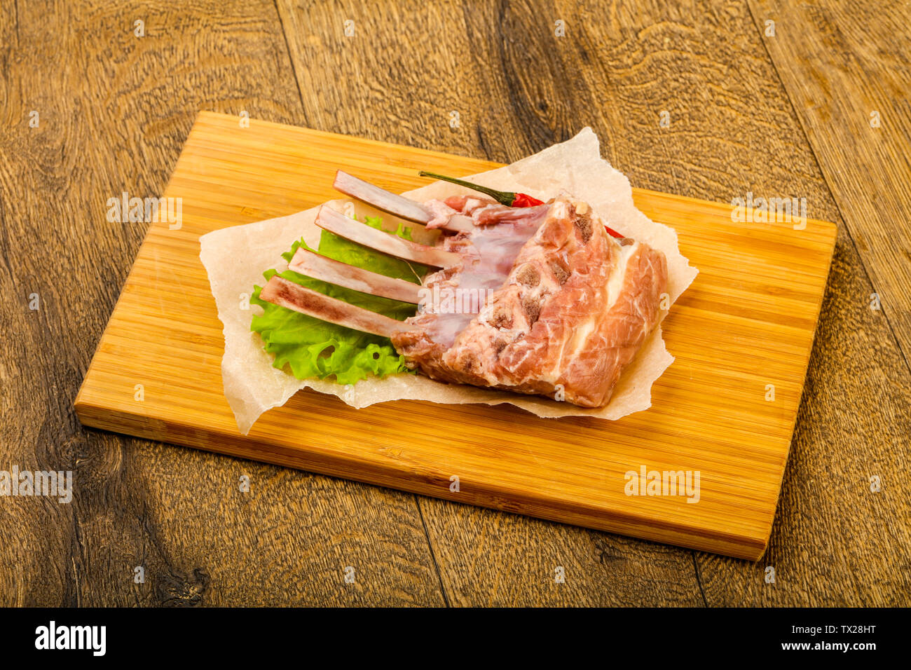 Raw lamb ribs with pepper ready for cooking Stock Photo - Alamy