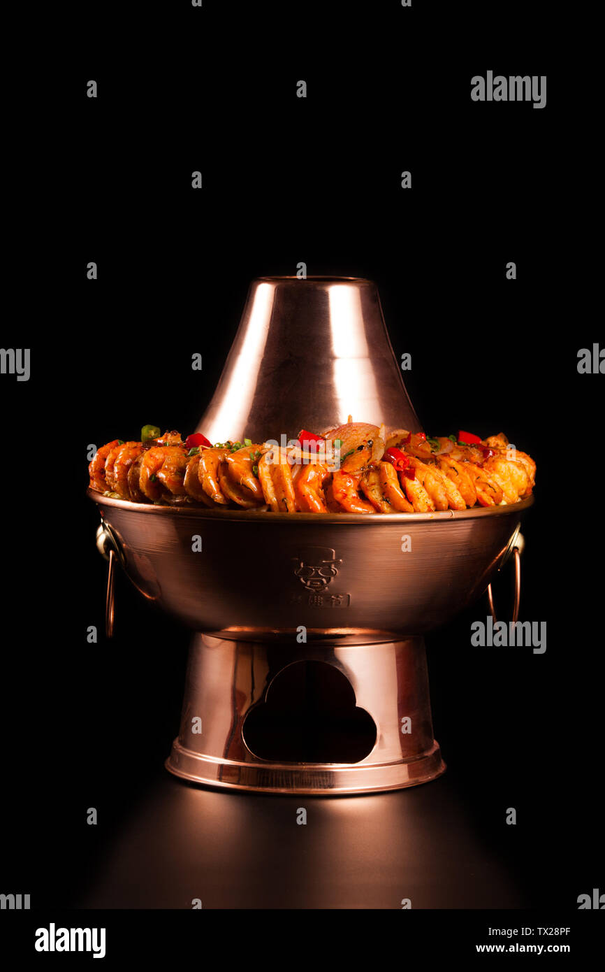 Carbon fire bullfrog pot Stock Photo - Alamy