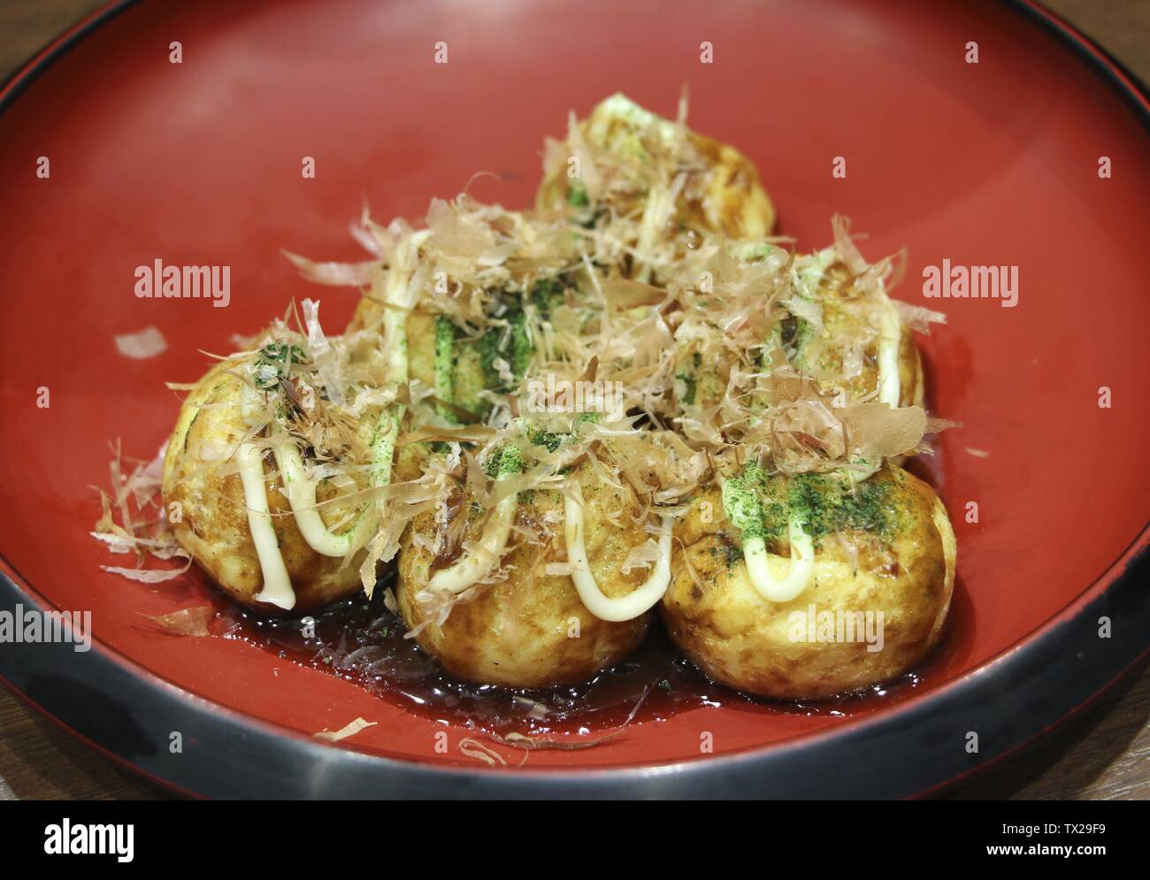 Photo taken in Osaka on June 20, 2019, shows takoyaki made of wheat ...