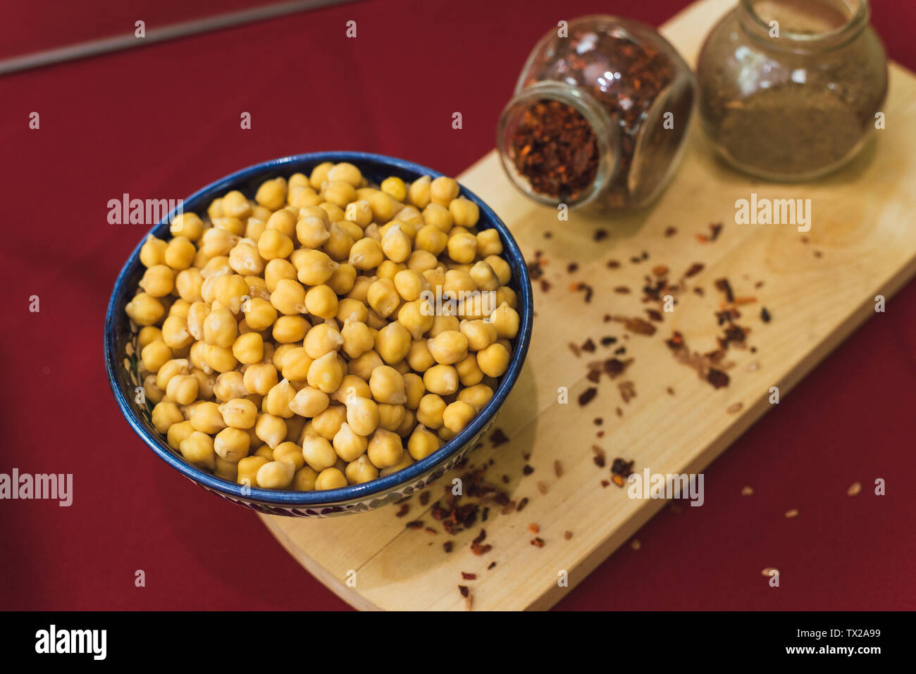 Preparation for cooking chickpeas and pilaf. Yellow chickpeas lie in an ...