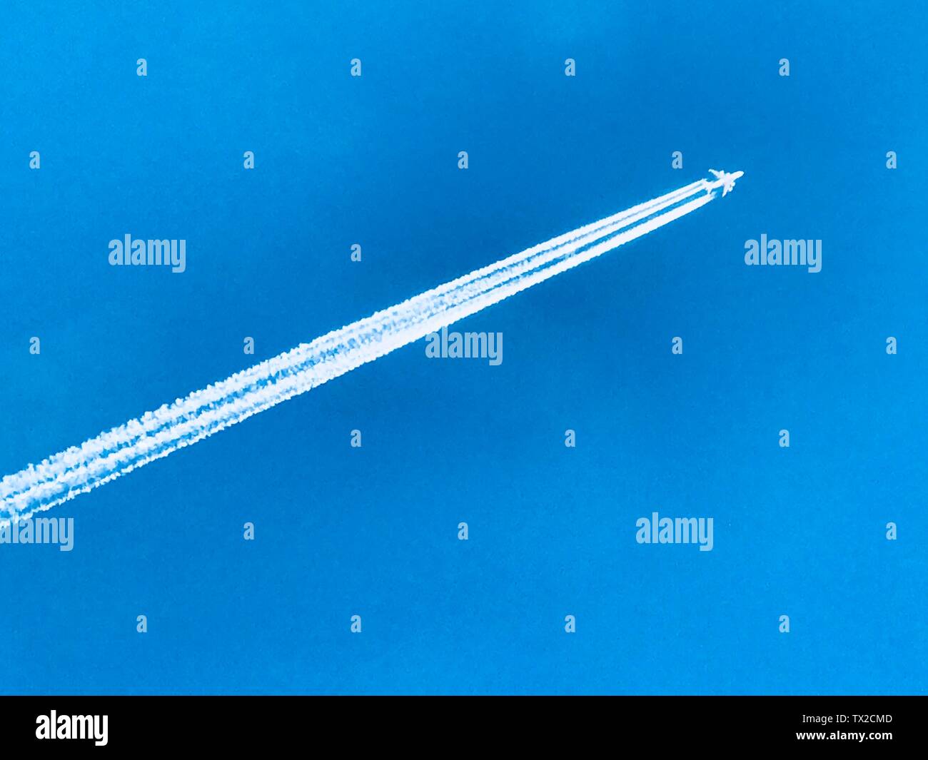 A flying plane, close-up Stock Photo - Alamy